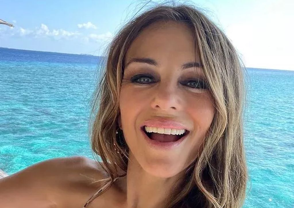 Elizabeth Hurley, 58, stuns in alluring pink swimsuit for fashion ...