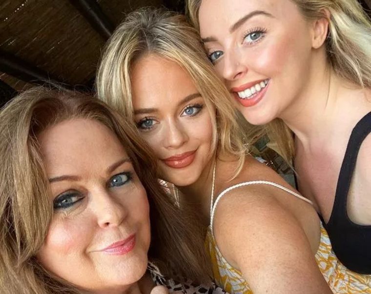 Emily Atack flaunts her stunning physique in a minimal bikini while on ...